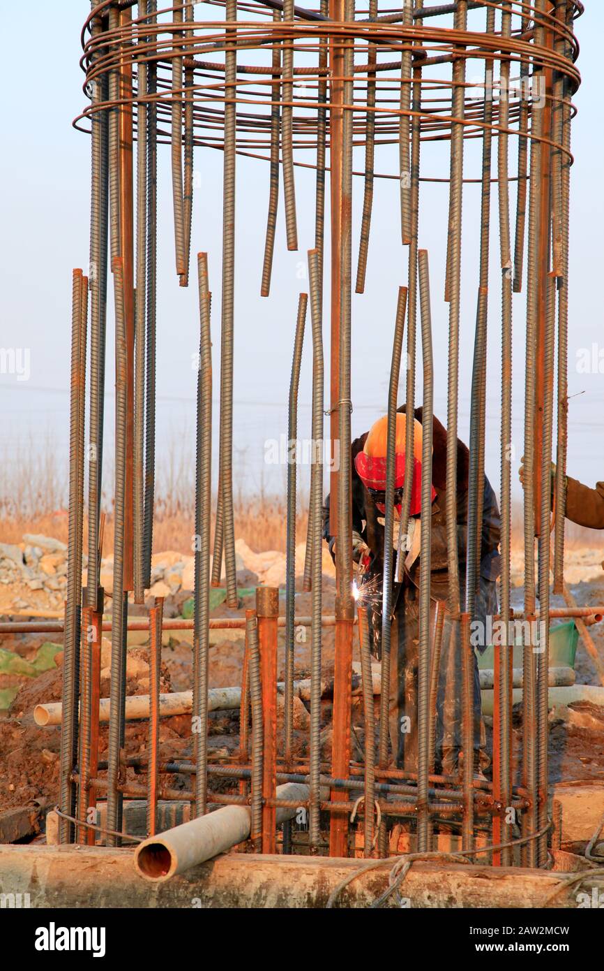 Bridge construction under performing the steel reinforcement of piling ...