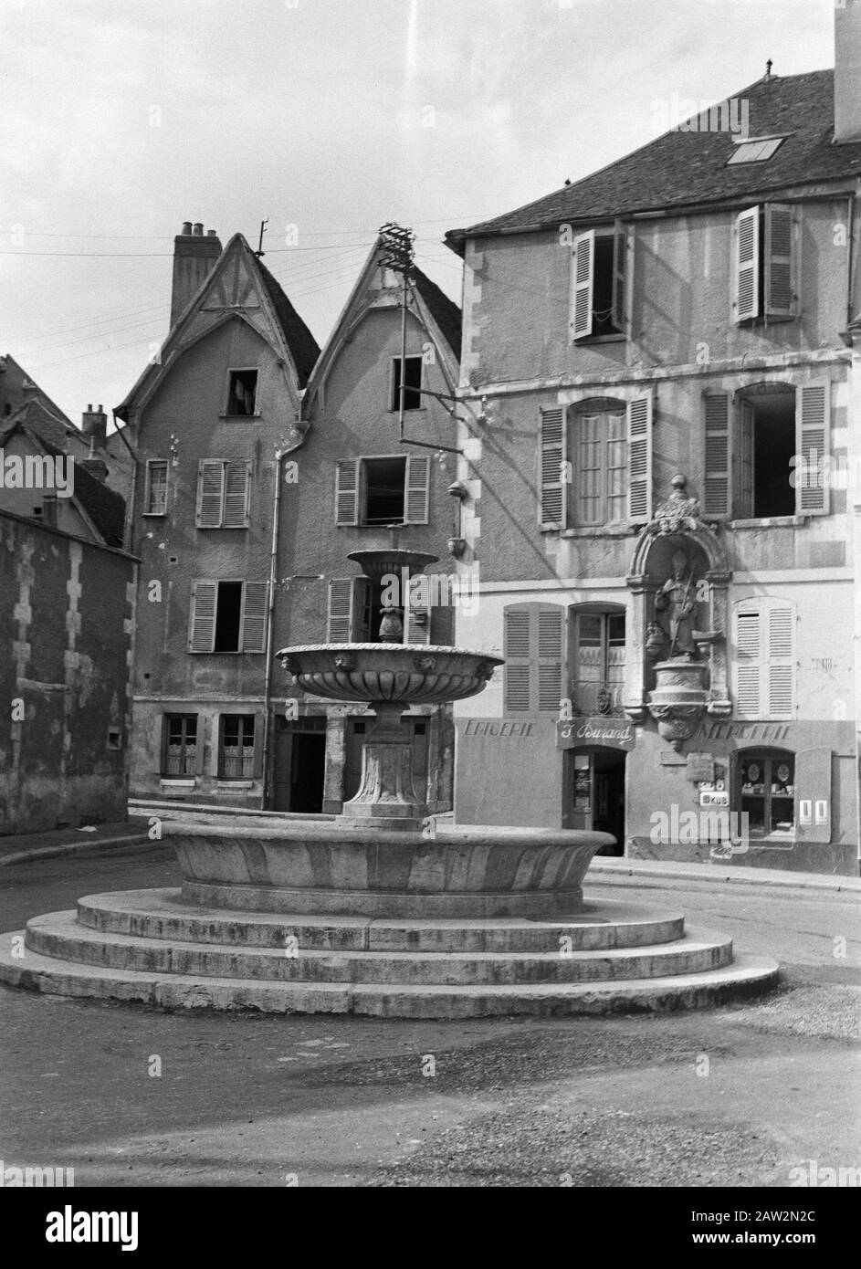 Journey to France Square with fountain; the facade in the background an ...
