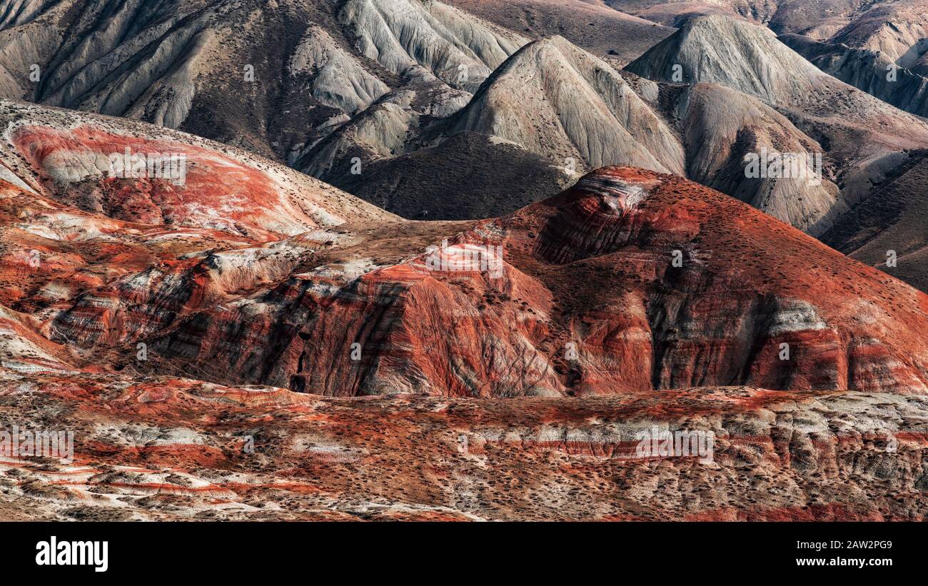 Striped red mountains landscape, the beauty of nature Stock Photo - Alamy