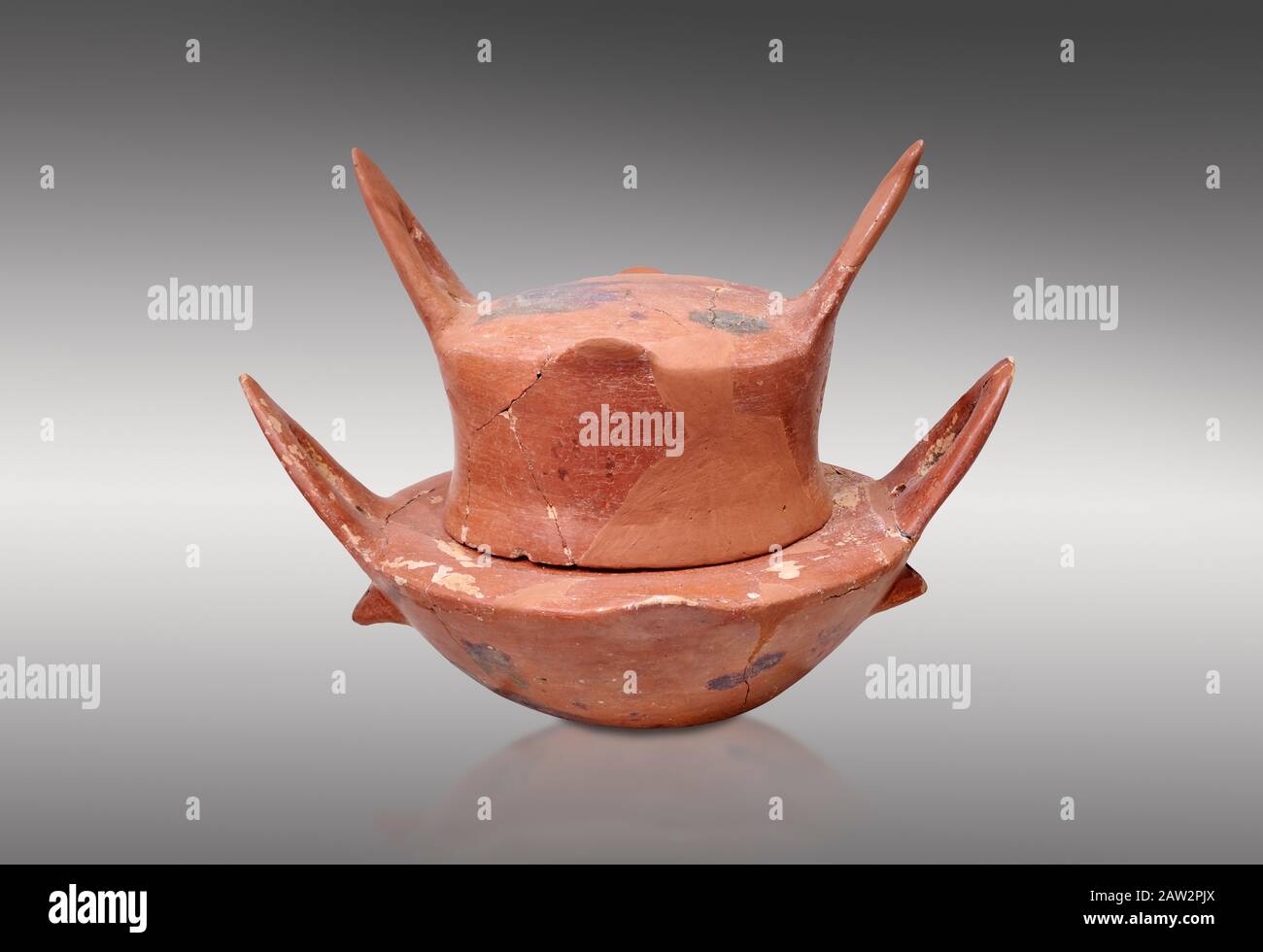 Very early unusual Minoan horned pot with white and red linear motifs ...