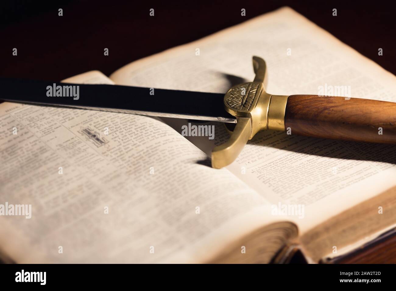 Ancient sword beside an open 150 Year Old Bible Stock Photo - Alamy