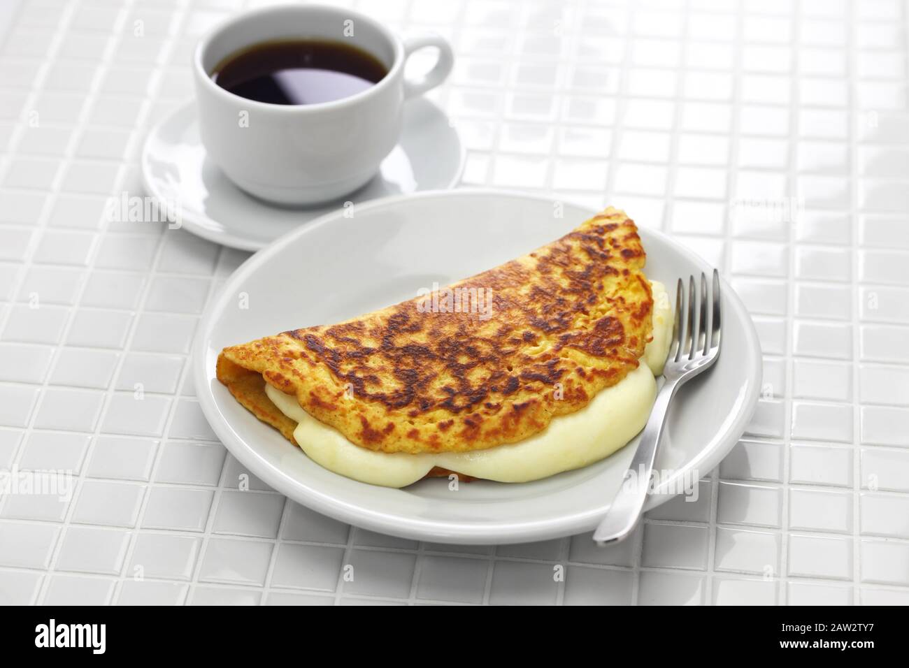 cachapa, venezuelan corn pancake with handmade cheese Stock Photo - Alamy