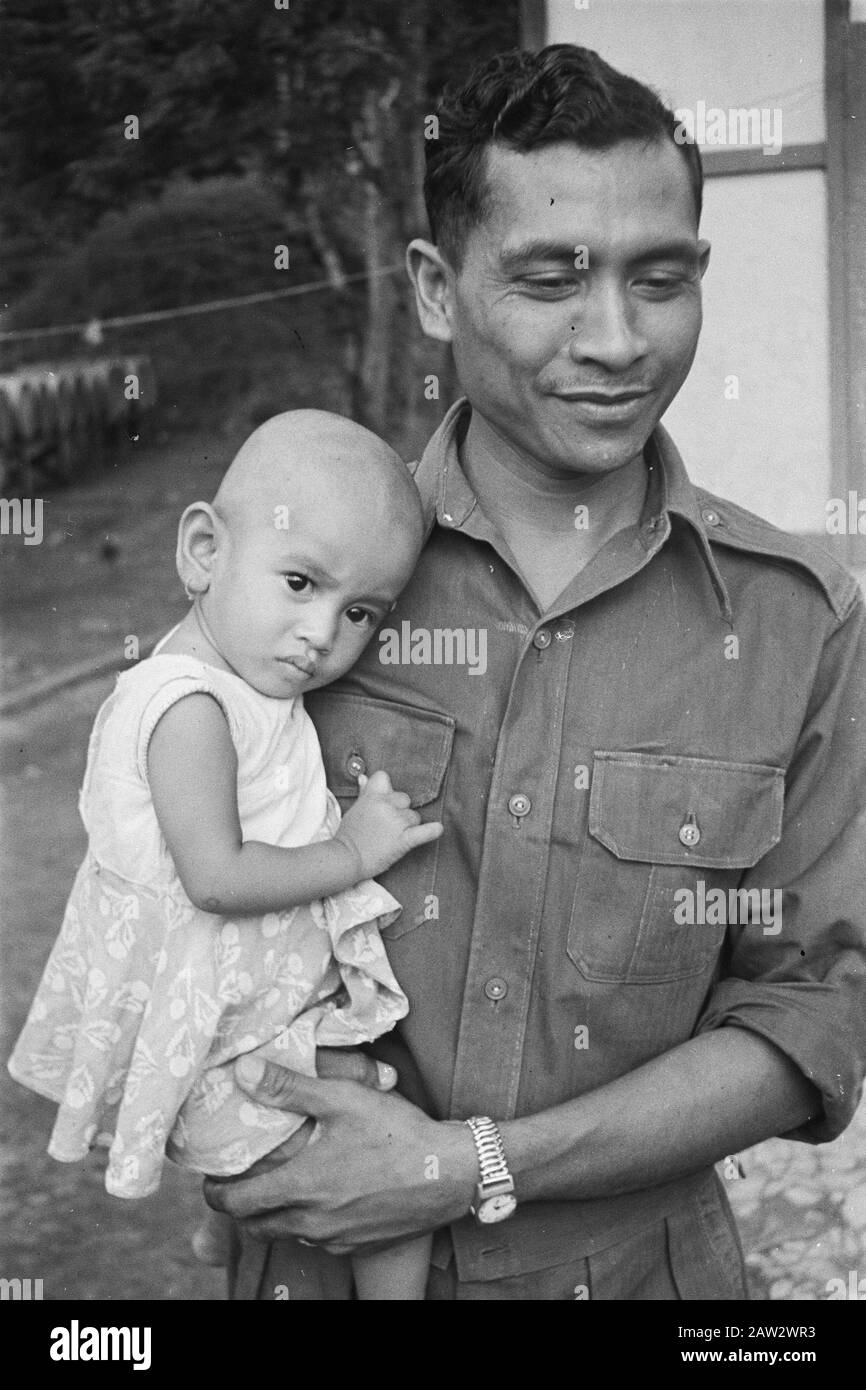 Borneo description: Portrait of an unknown KNIL soldier with baby on ...