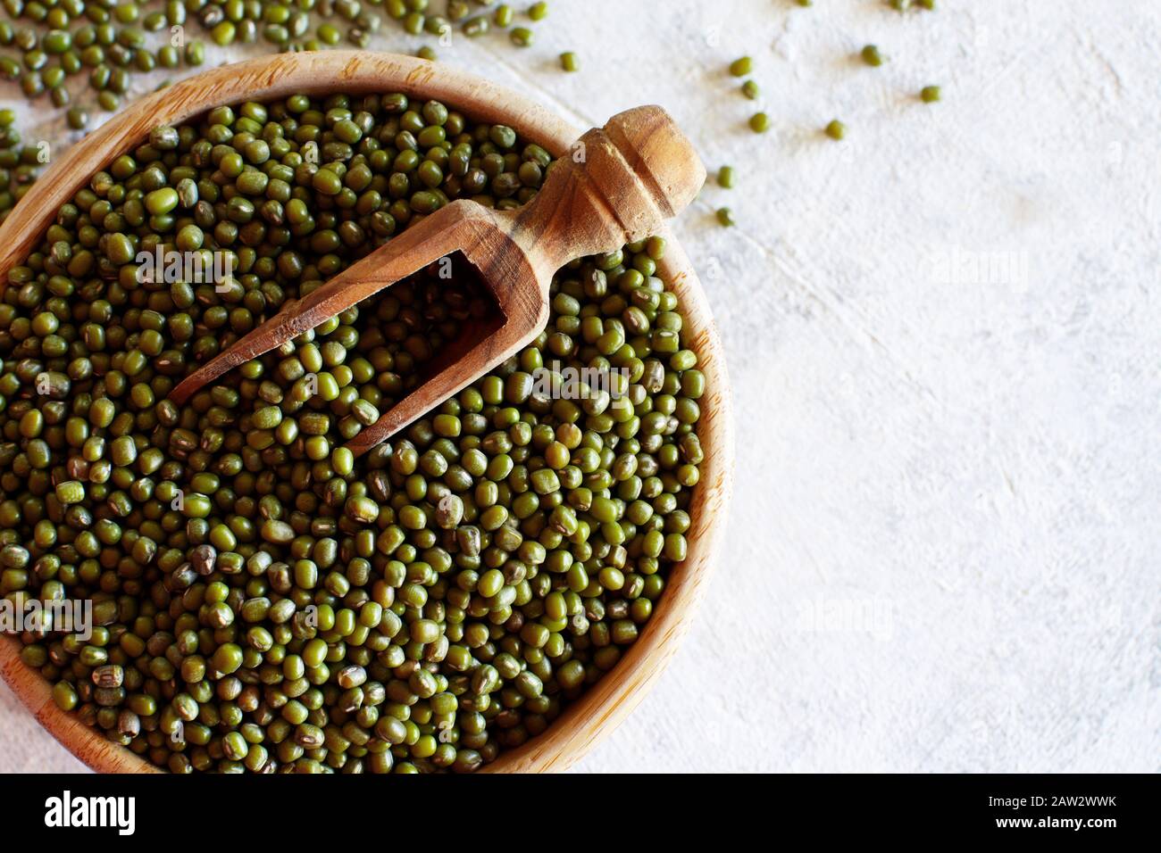 Dried mung beans in wooden bowl close up Stock Photo - Alamy