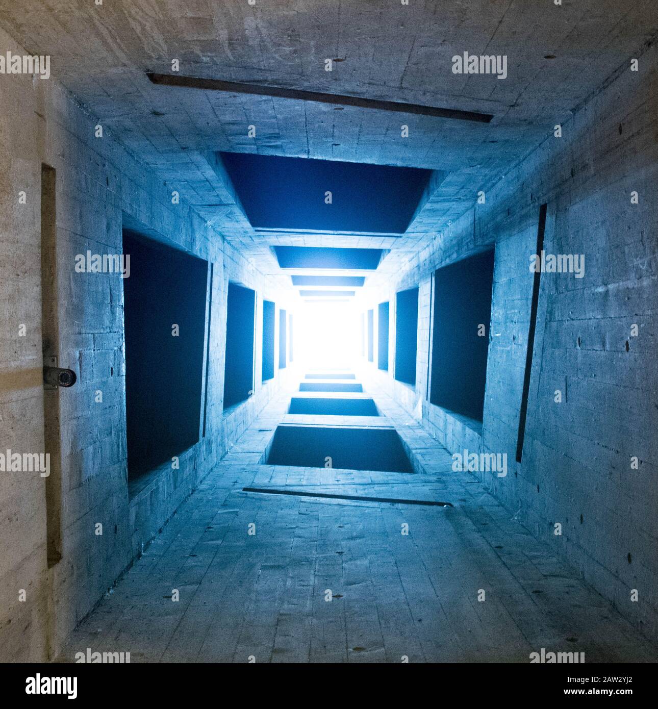 Blue light - Unreal looking air shaft or roof dome or ceiling. Abstract ...