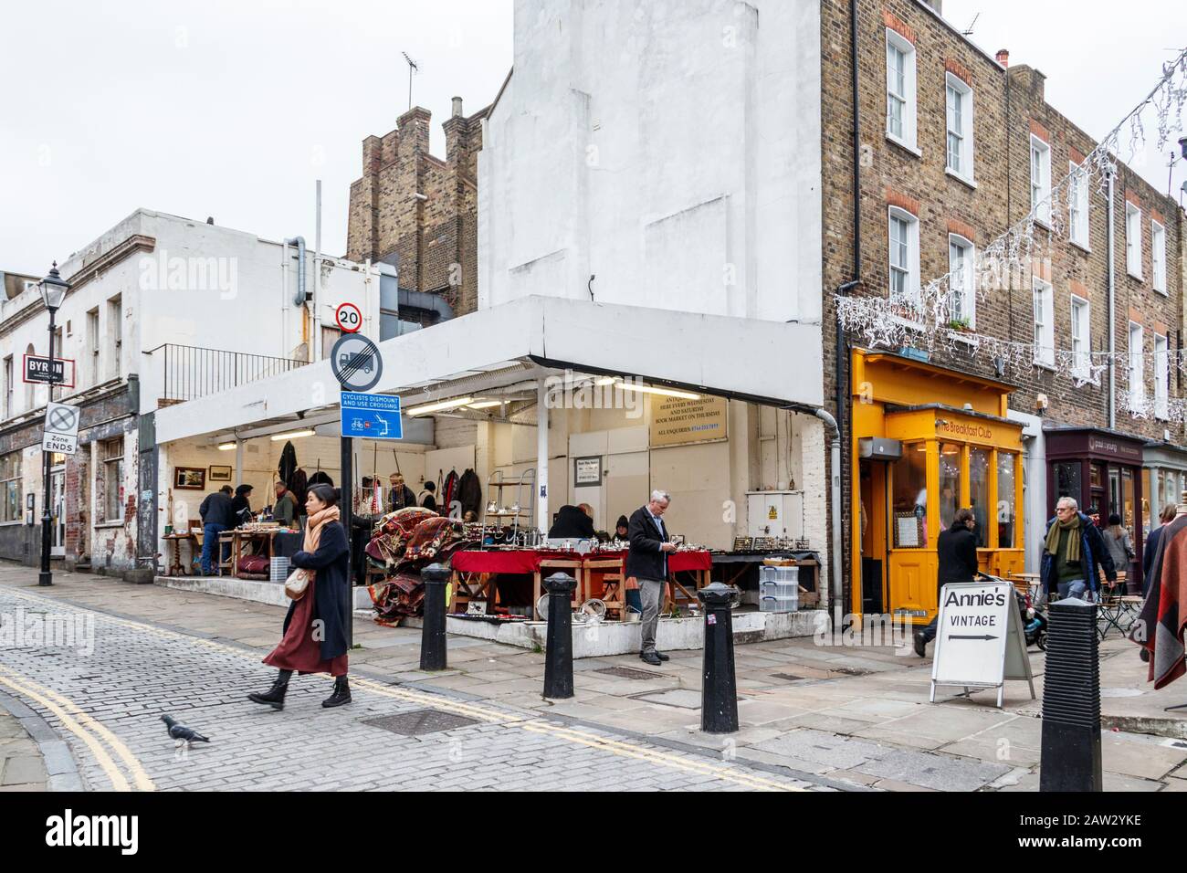 Shoppers browsing the antique shops and stalls in Camden Passage at The ...