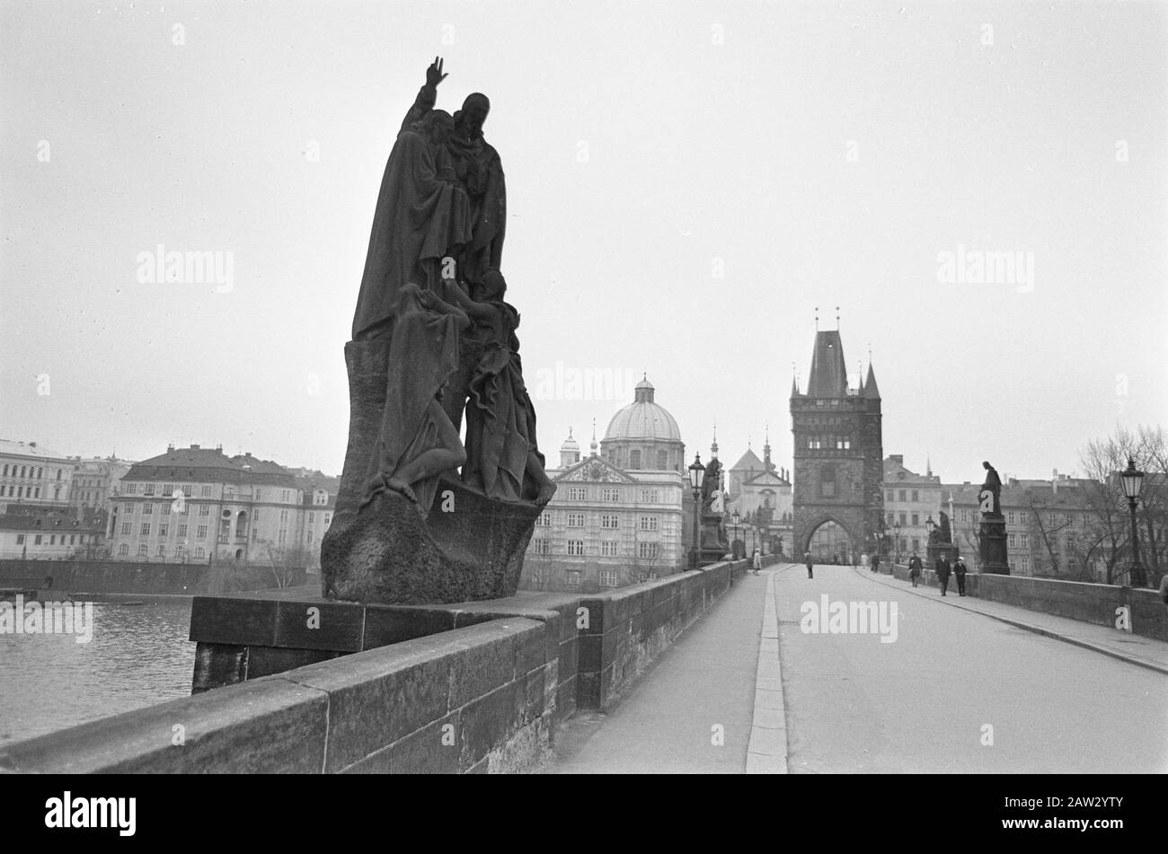 Prague. Charles Bridge over the Vltava with saints and overlooking the ...