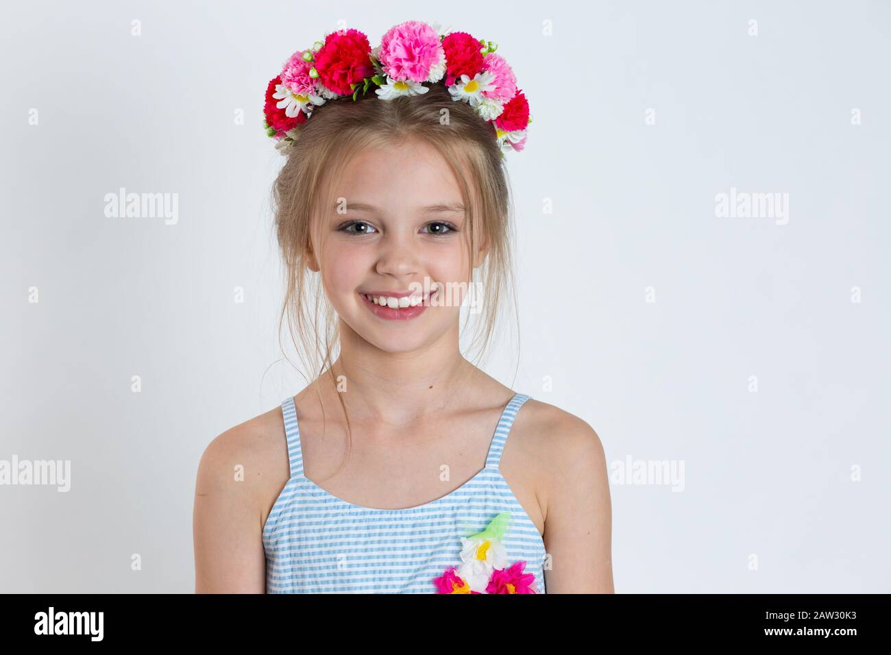 Cute kid girl smiling looking at you camera happy posing. Closeup ... Cute kid girl smiling looking at you camera happy posing. Closeup ...