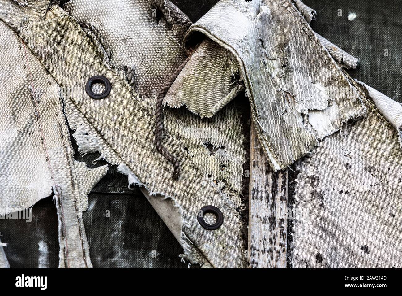 Torn tarp hi-res stock photography and images - Alamy