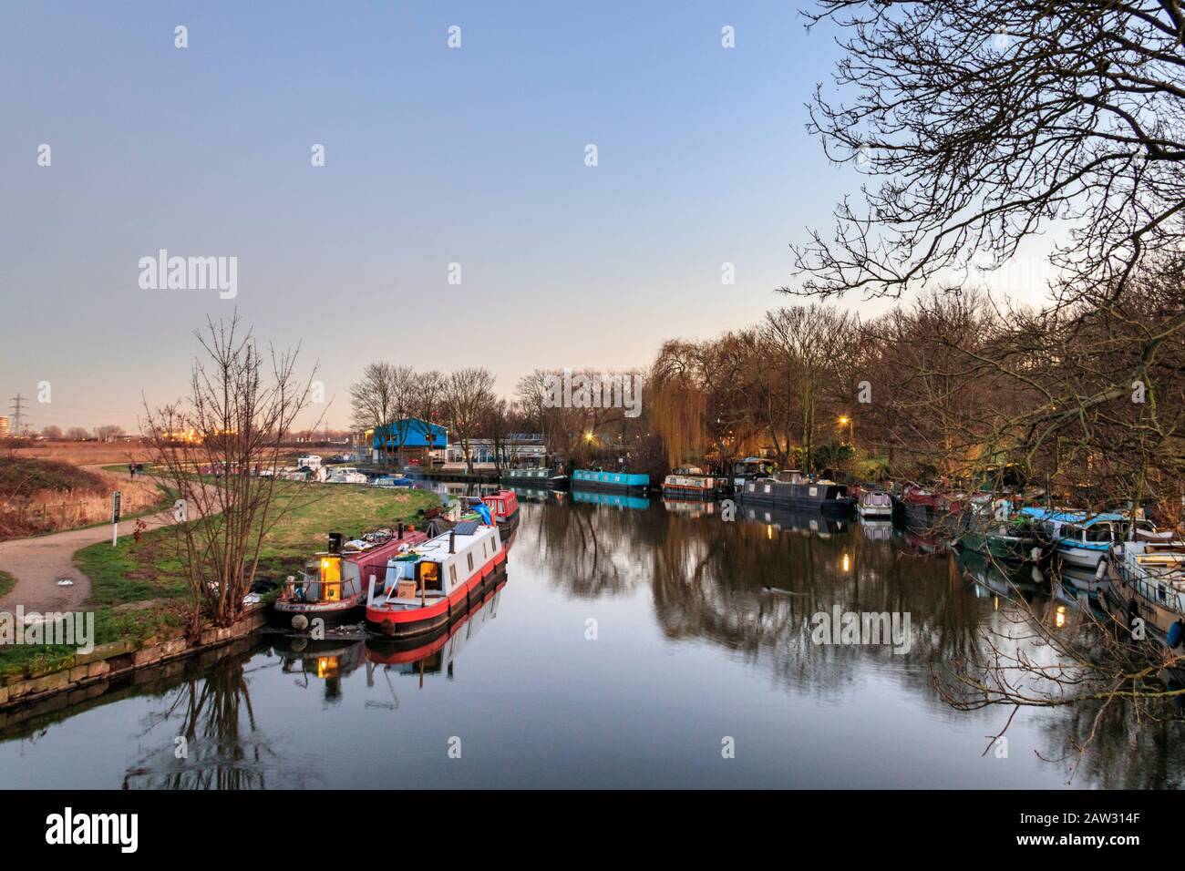 Boats on the River Lea at Upper Clapton, on a winter evening, London ...