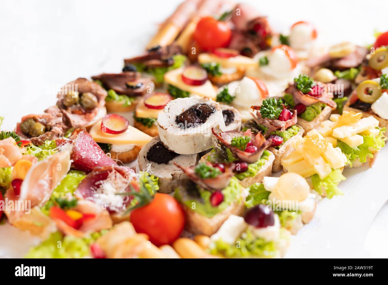 Table full of appetizers hi-res stock photography and images - Alamy