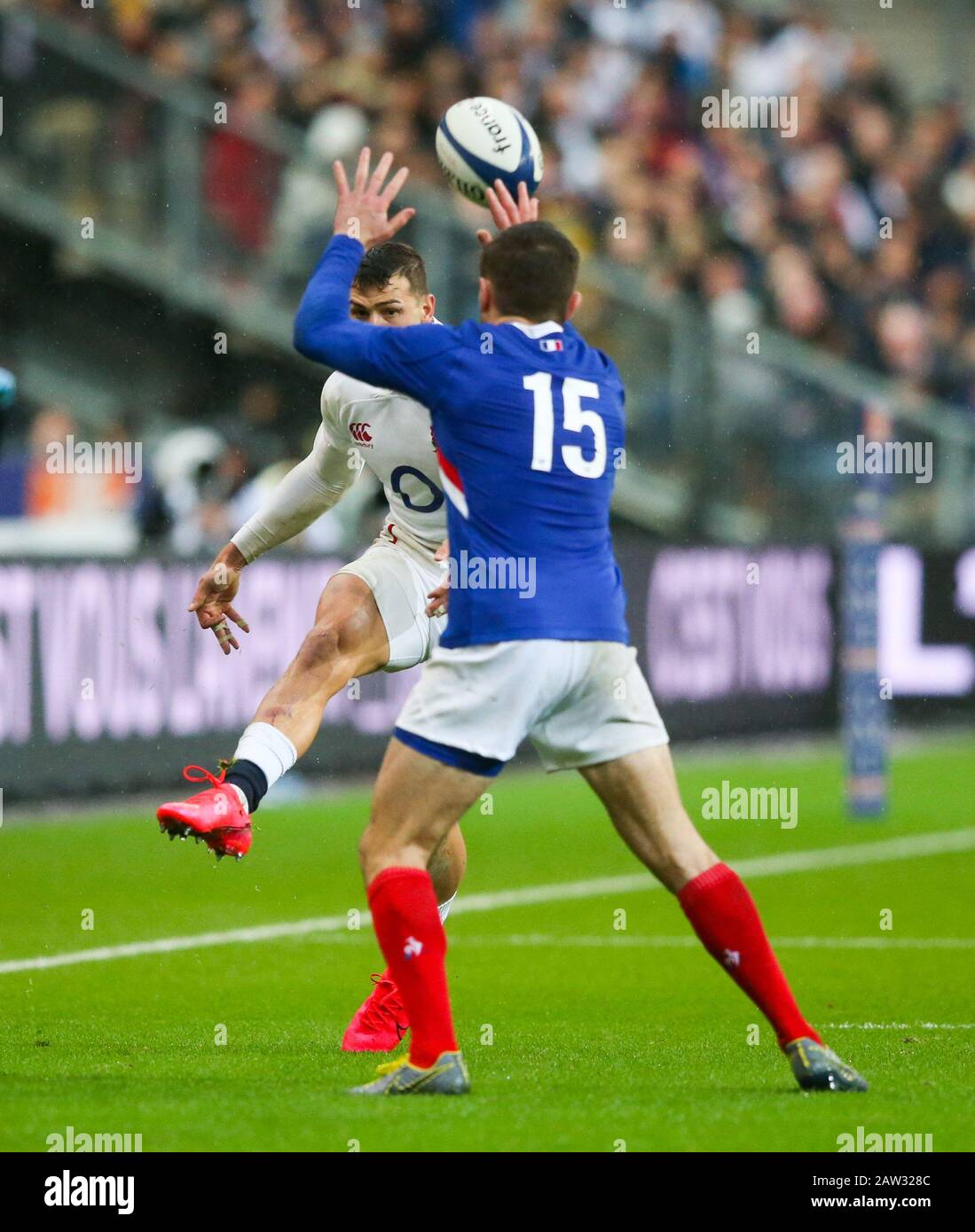 Jonny May of England chips over Anthony Bouthier of France to set up ...
