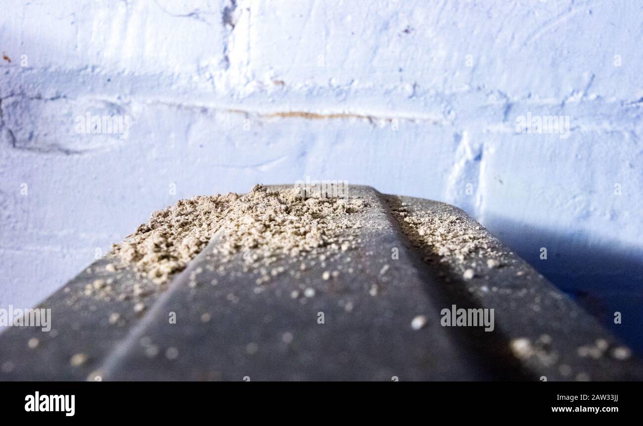 A tool shed machine top which has been covered in dust and particles ...