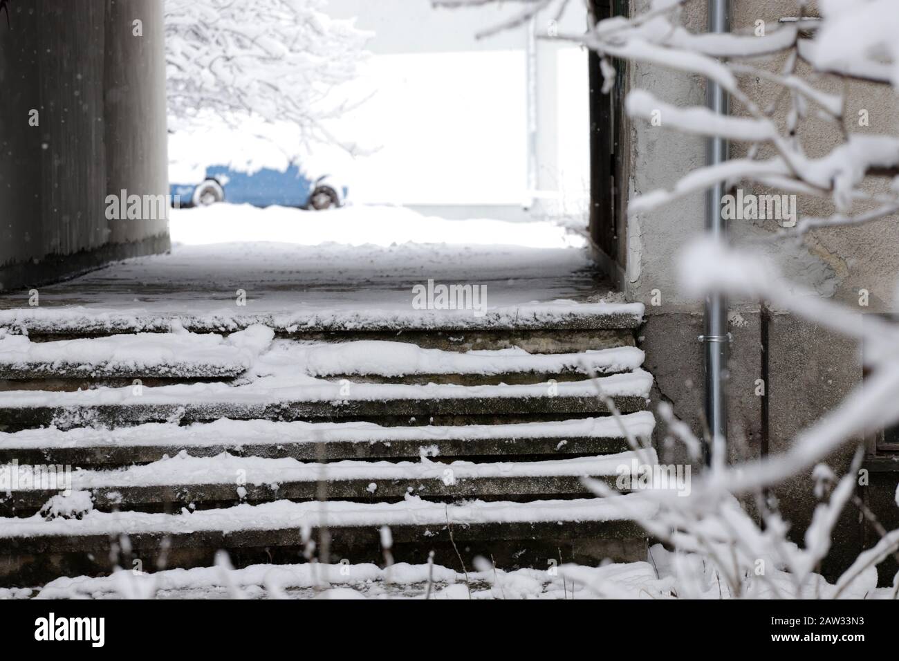Dangerous uncleaned stairs in front the building, slippery stairs. Icy ...
