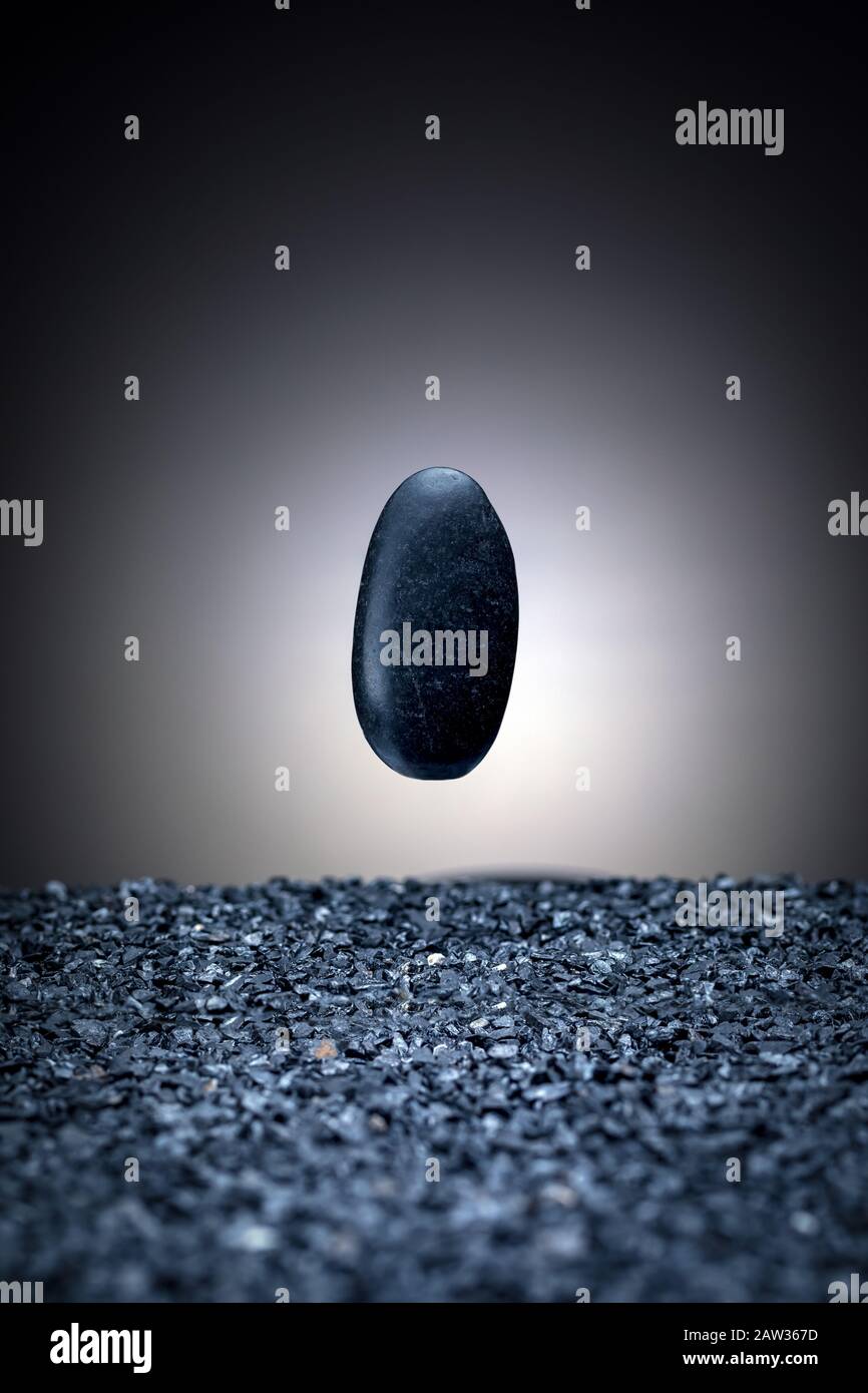 Flying pebbles hi-res stock photography and images - Alamy