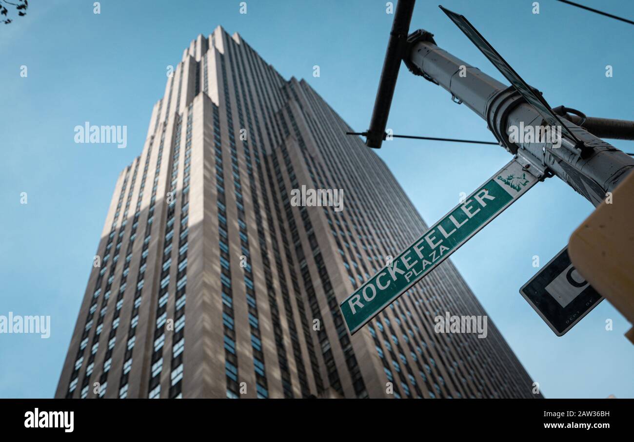 Street sign depicting it is Rockefeller Plaza in Midtown Manhattan, New ...
