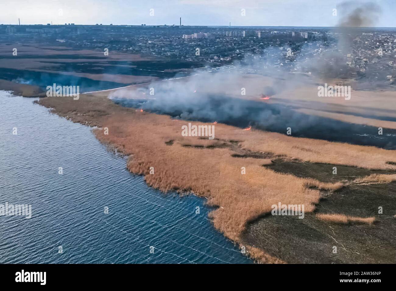 Steppe fire. Burning dry grass, fire and smoke Stock Photo - Alamy