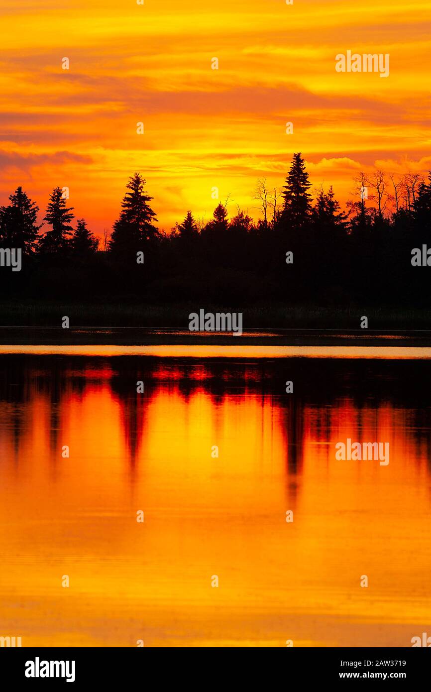 Sunset over lake Stock Photo - Alamy
