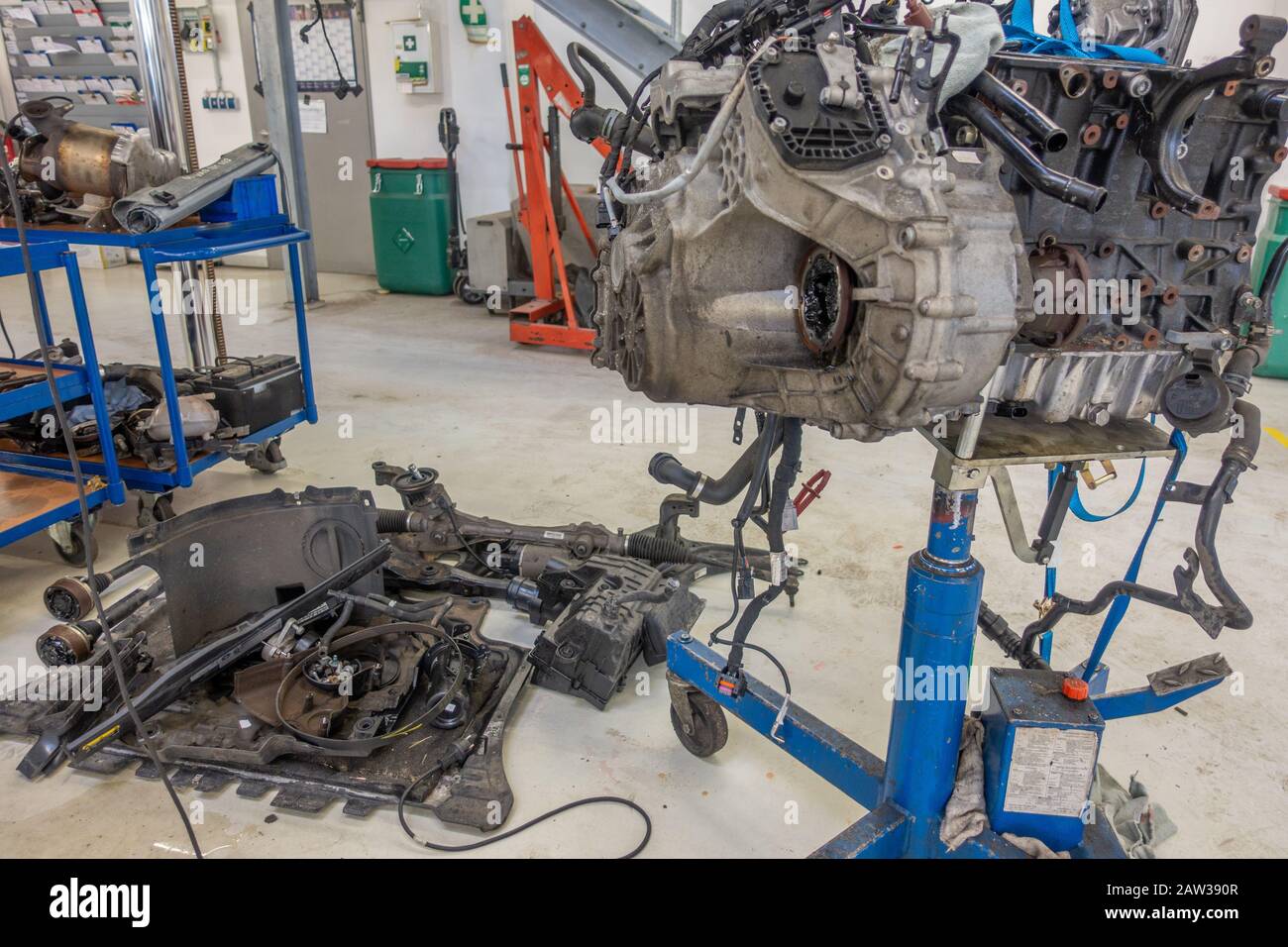 in a garage the engine of a car was removed to be repaired Stock Photo ...