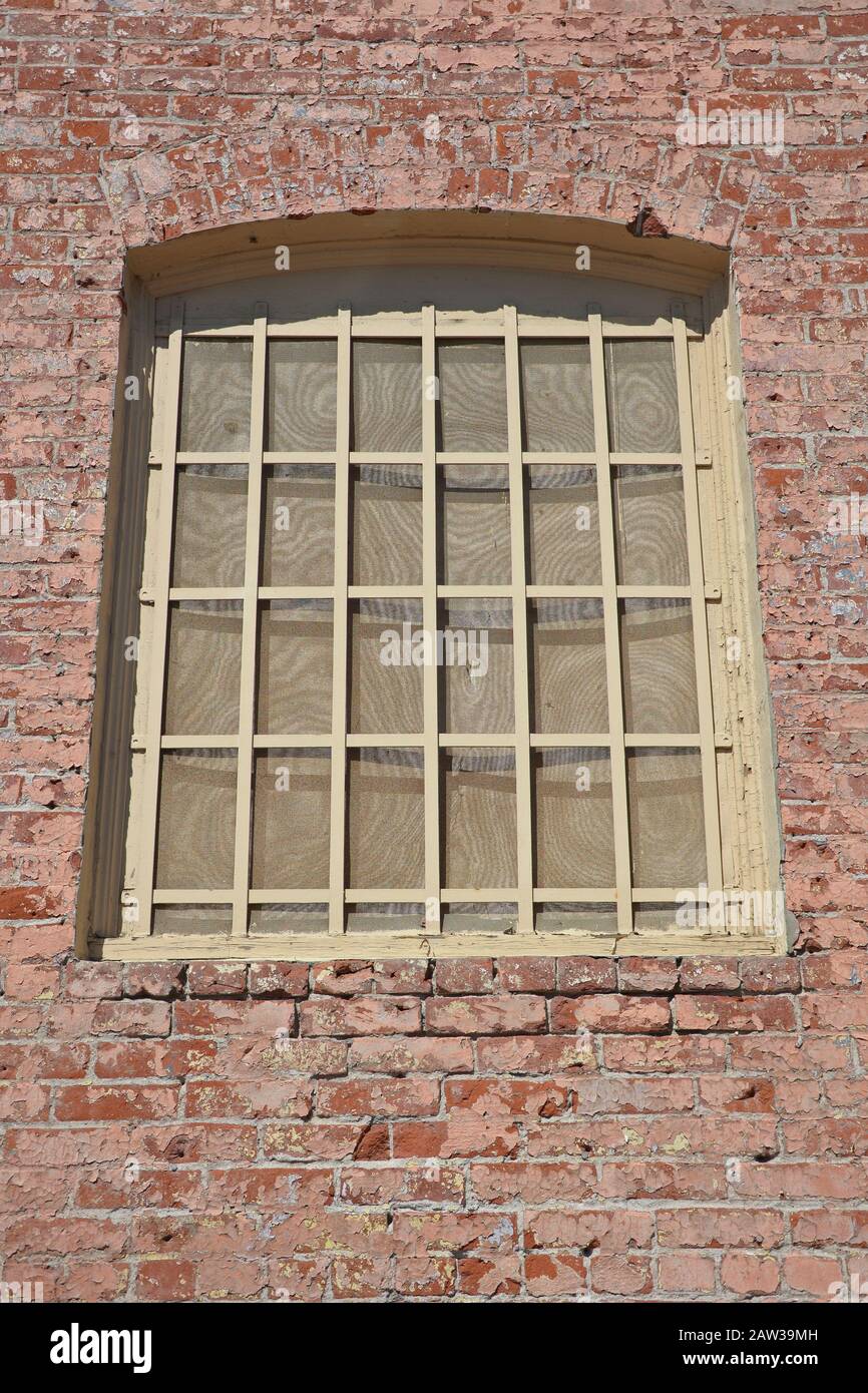Old window in brick wall exterior Stock Photo - Alamy