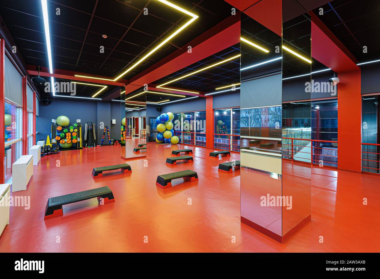 Aerobics gym room interior with step decks Stock Photo - Alamy