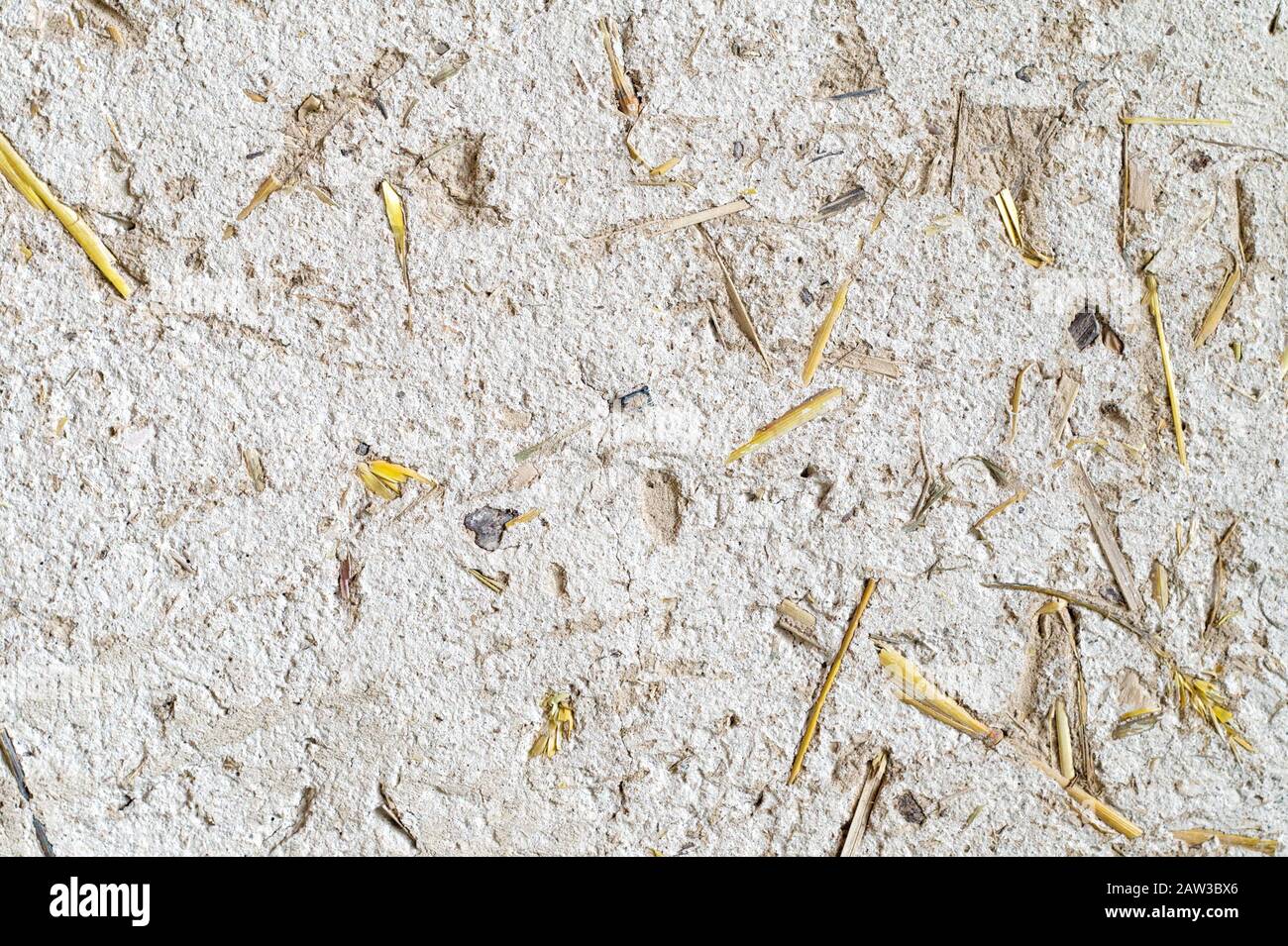 Background of adobe clay plaster texture with straw Stock Photo - Alamy