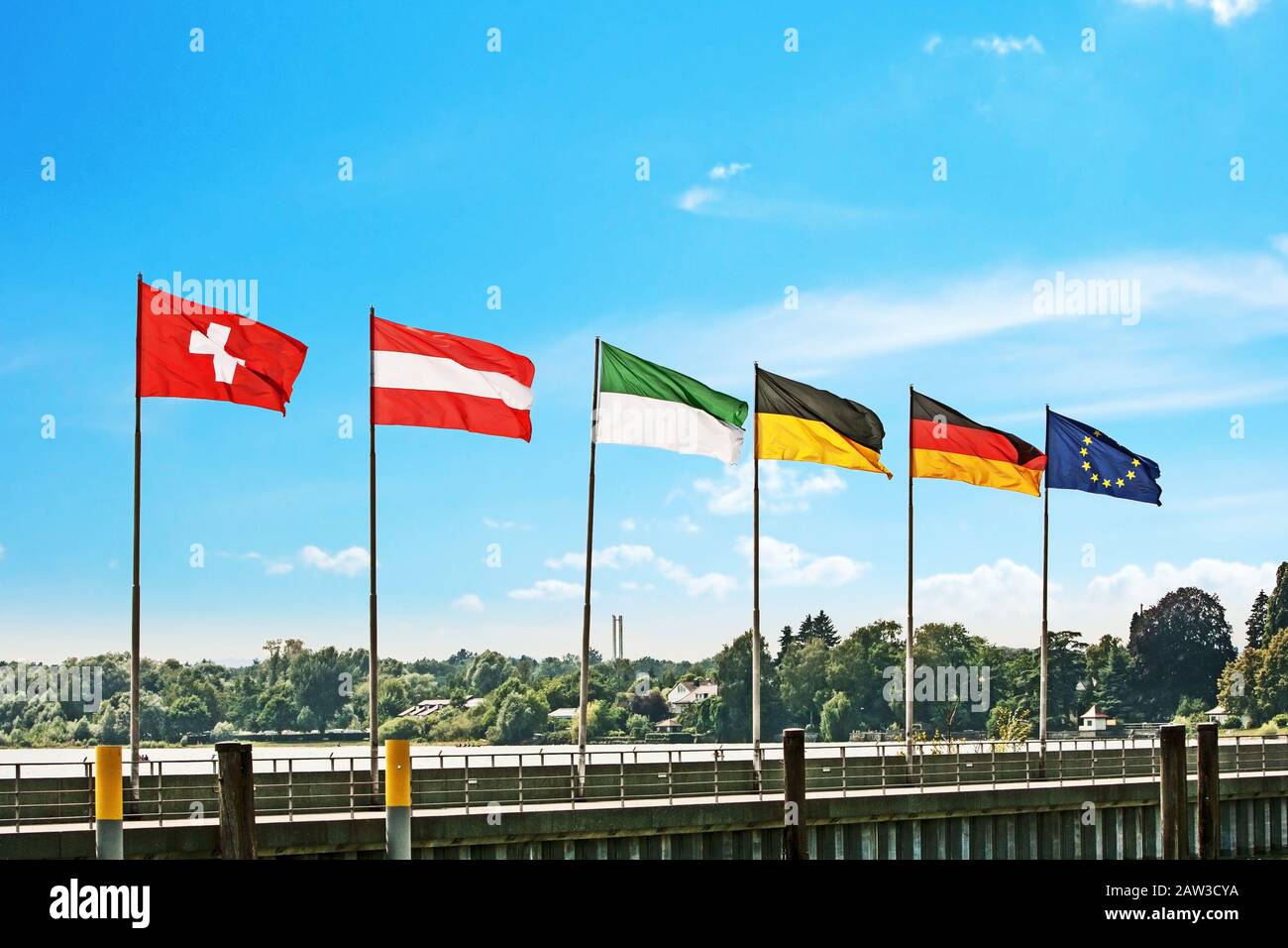 Flags of Germany, Switzerland, Austria and Europe in a row at a pier at ...