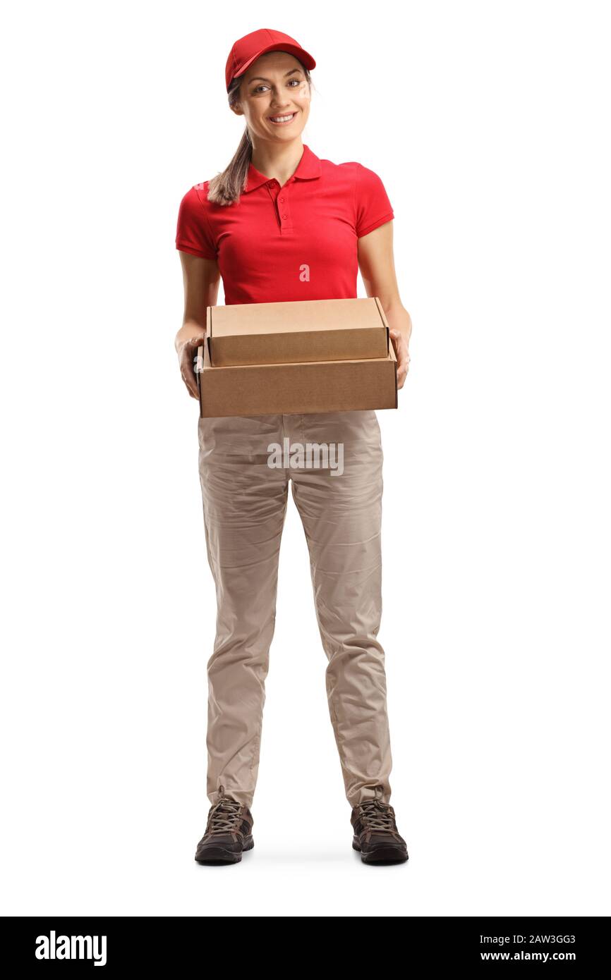 Full length portrait of a young delivery woman holding packages and ...