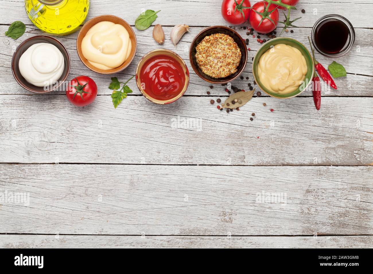 Set of various sauces. Popular sauces in bowls - ketchup, mustard ...