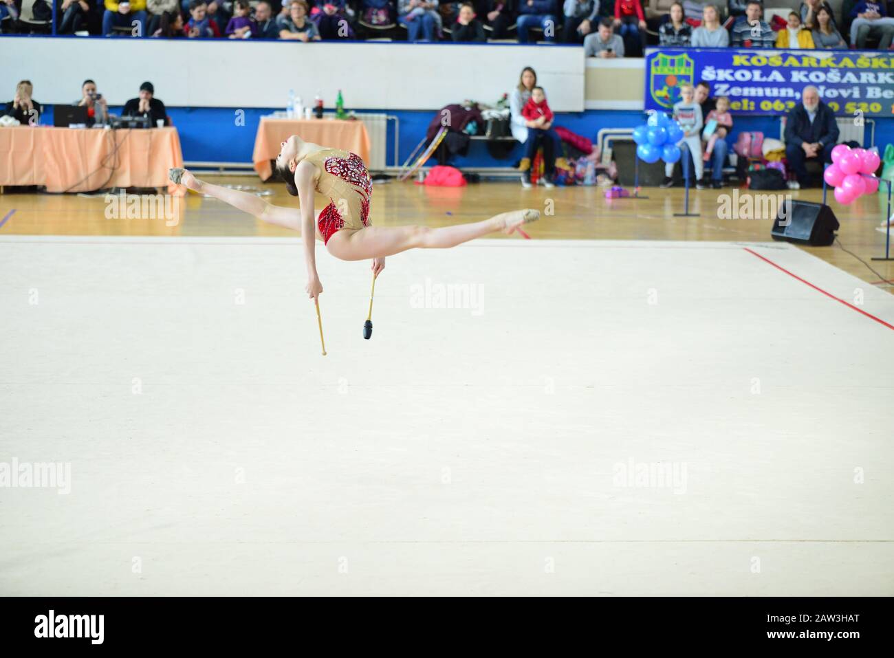 Girl doing rhythmic gymnastics Stock Photo - Alamy