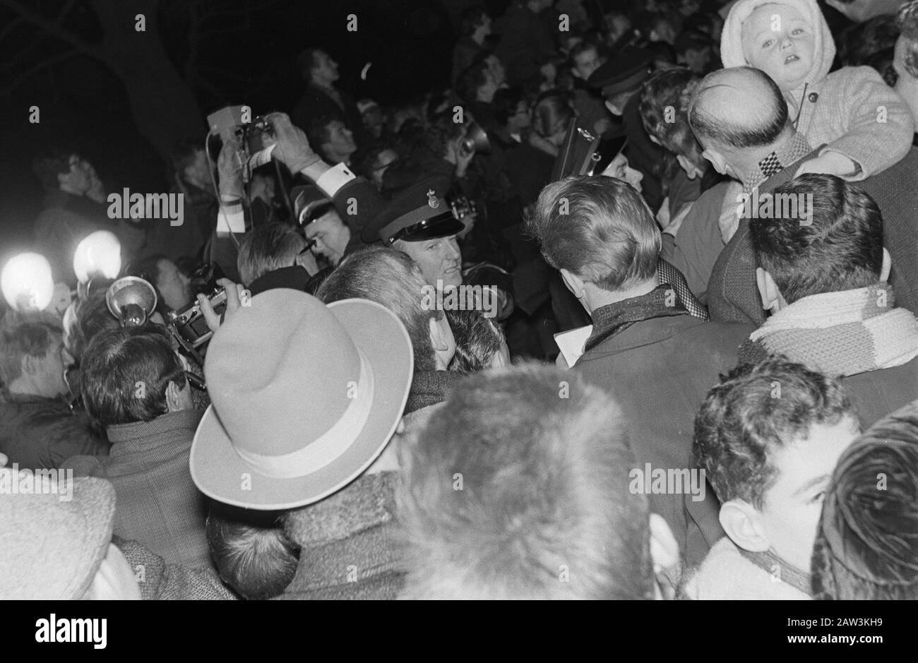 Princess Irene and Prince Don Carlos, pressed for the Palace on arrival ...