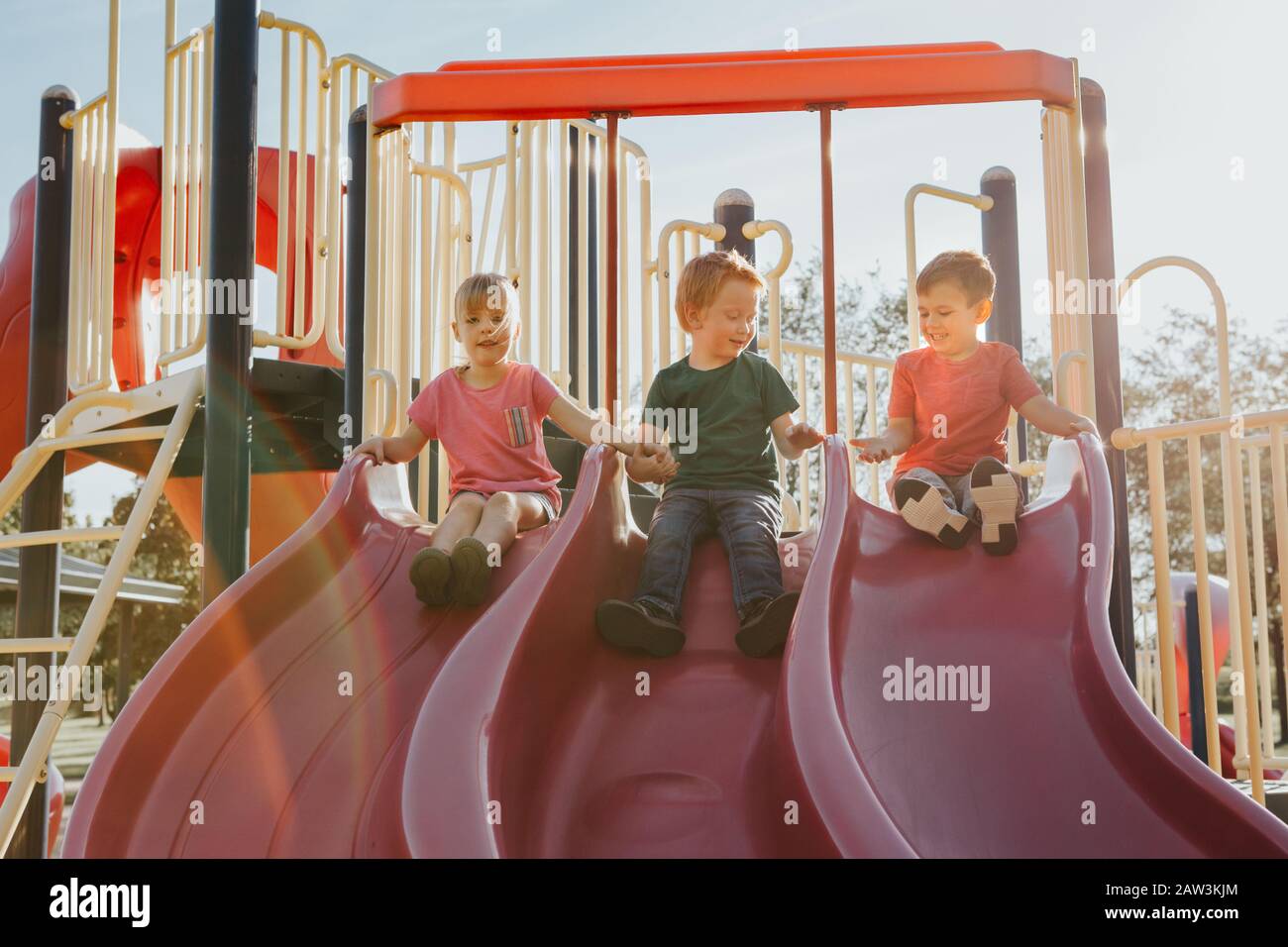 Girl child playground slide 5 child playground slide hi-res stock ...