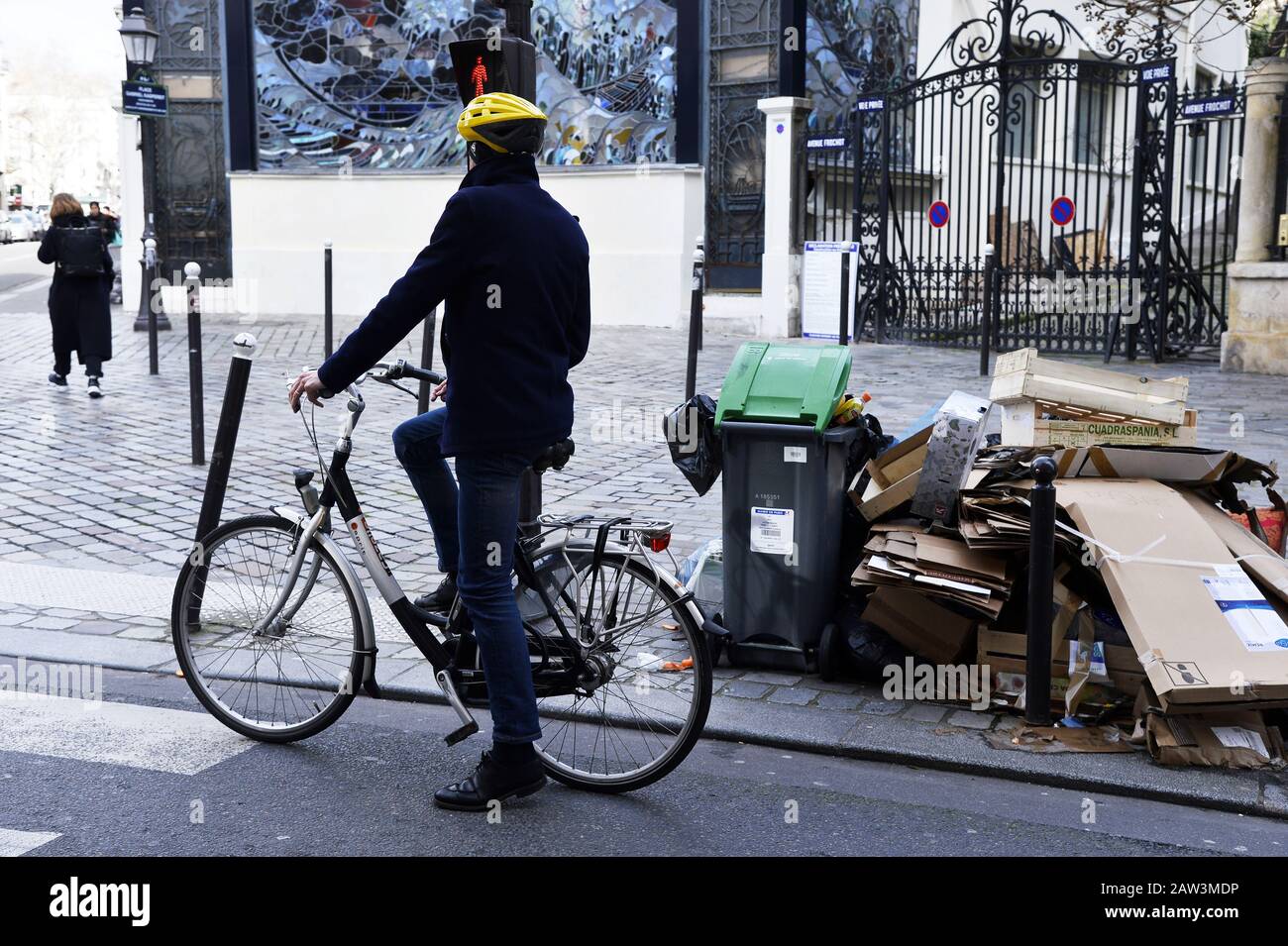 Garbage cans on the sidewalk in Paris - france Stock Photo - Alamy