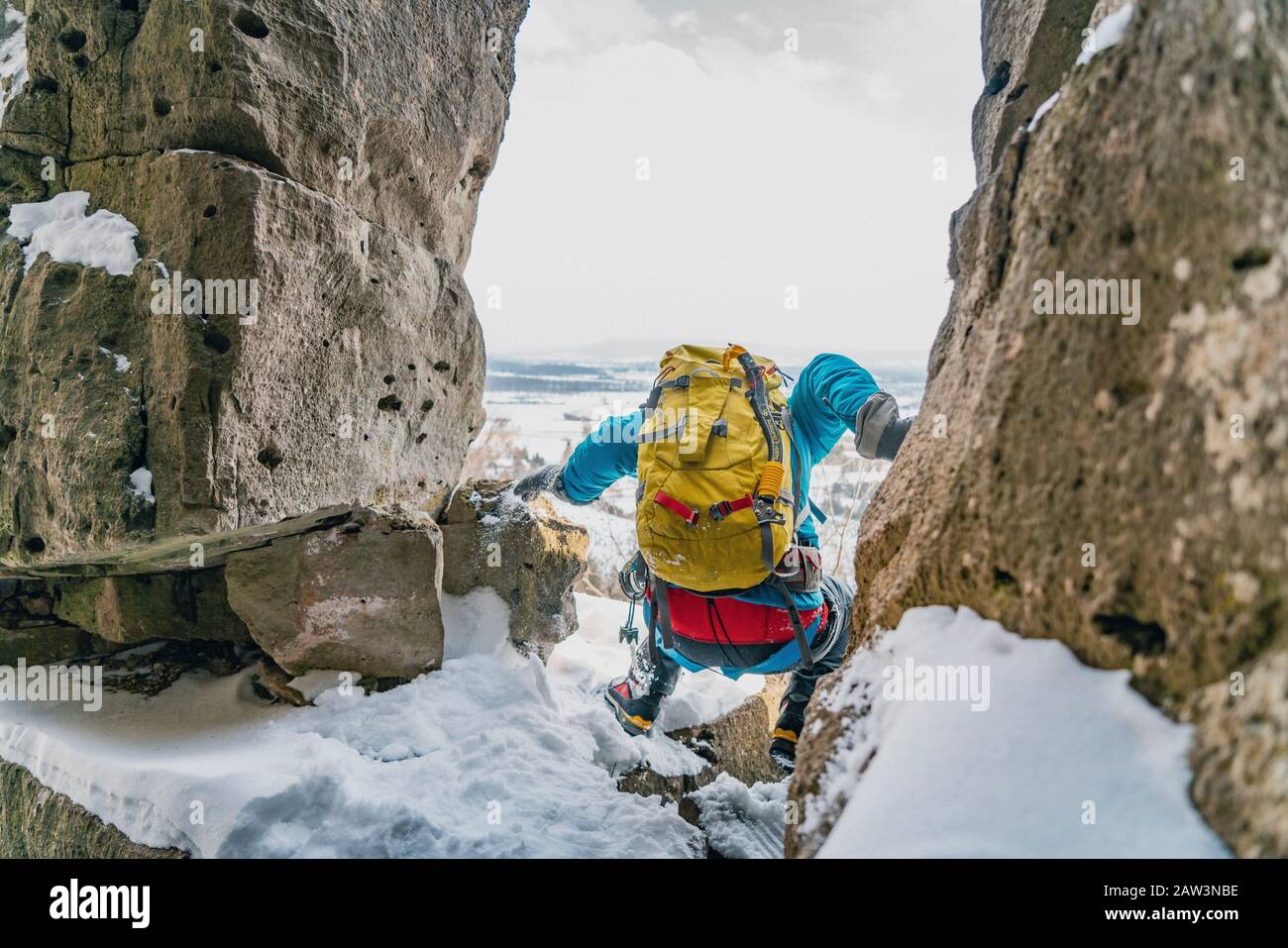 Down Climbing Between Two Rock Pillars Stock Photo - Alamy