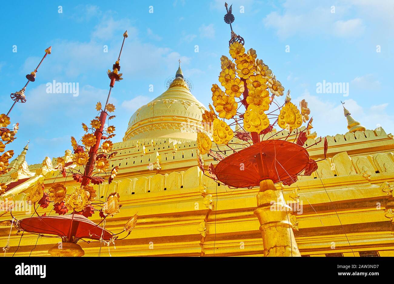 The main stupa of Shwezigon is covered with molding and gilt, it's ...
