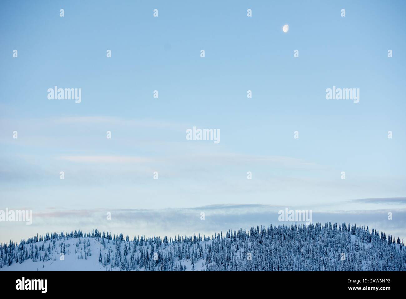 Beautiful moonrise over the snowy peaks Stock Photo - Alamy