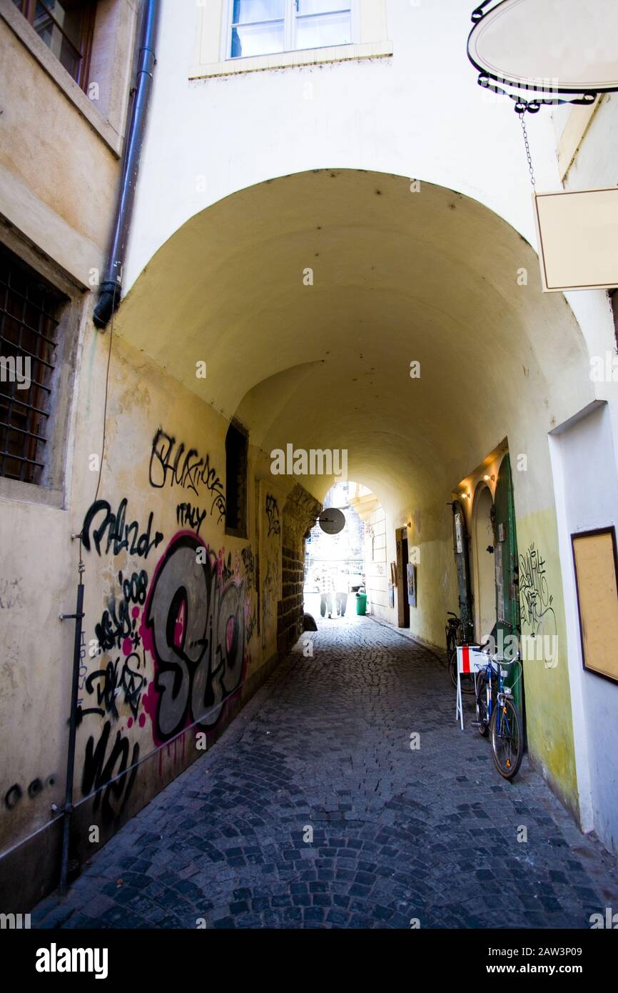 View of a narrow passage between buildings in the old part of Prague ...