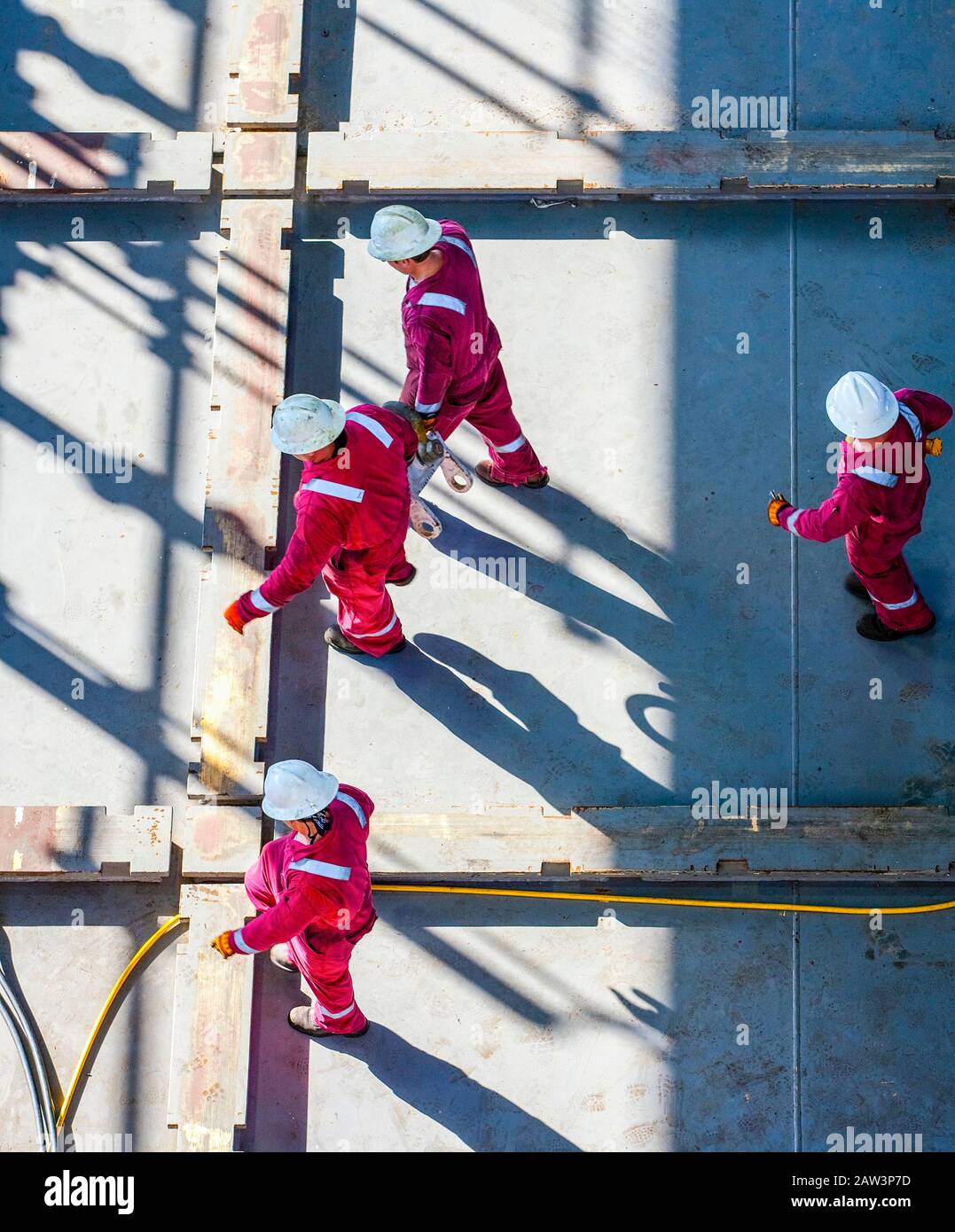 Shipyard maintenance workers onboard offshore oil platform Stock Photo ...