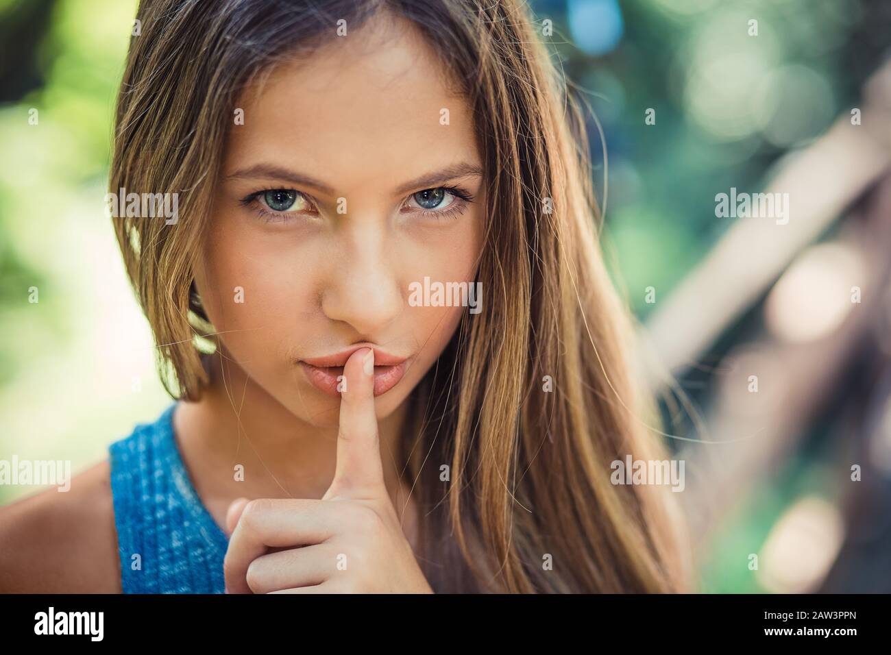 Shh, calm down, be quiet, do not scare the birds animals. Pretty woman ...