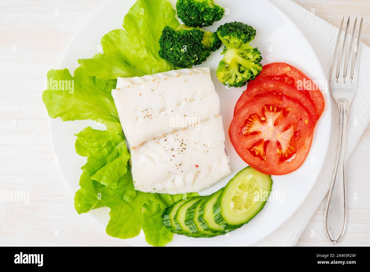 Steamed cod fish. Paleo, keto, fodmap healthy diet with vegetables on ...