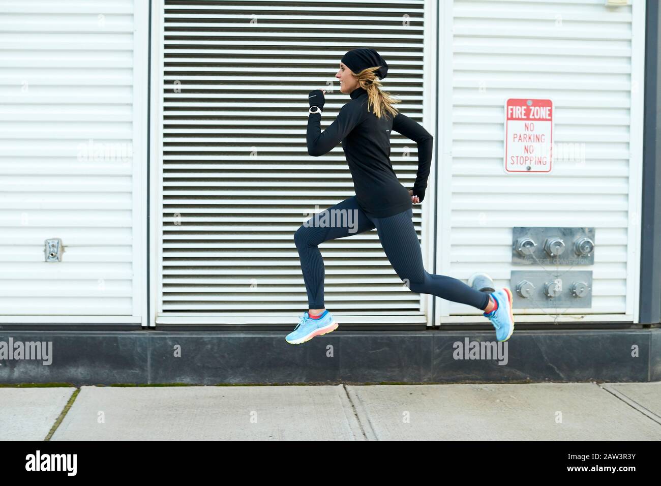 Jumping woman in working hi-res stock photography and images - Alamy