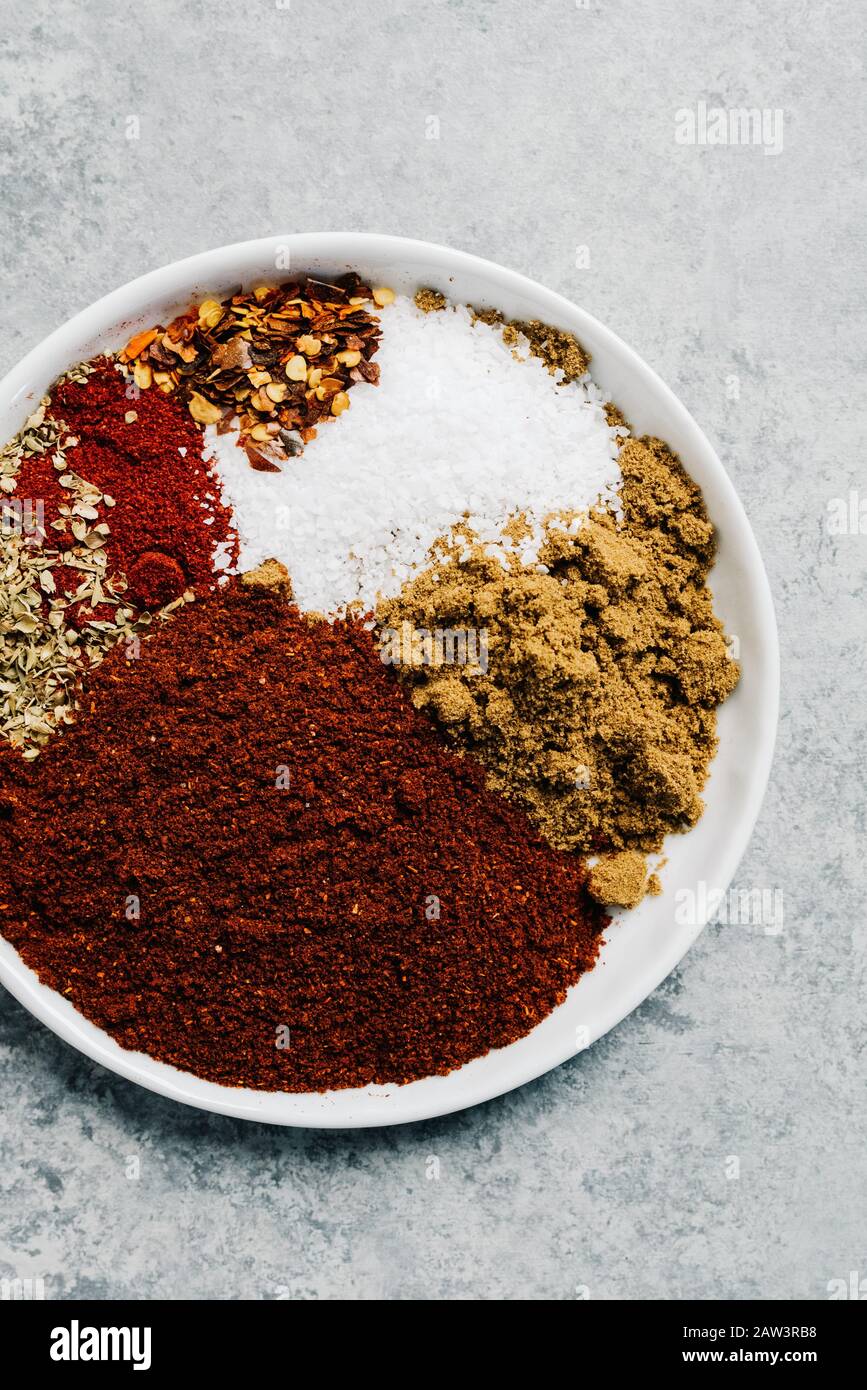 Assorted blend of spices for a chili con carne recipe Stock Photo - Alamy
