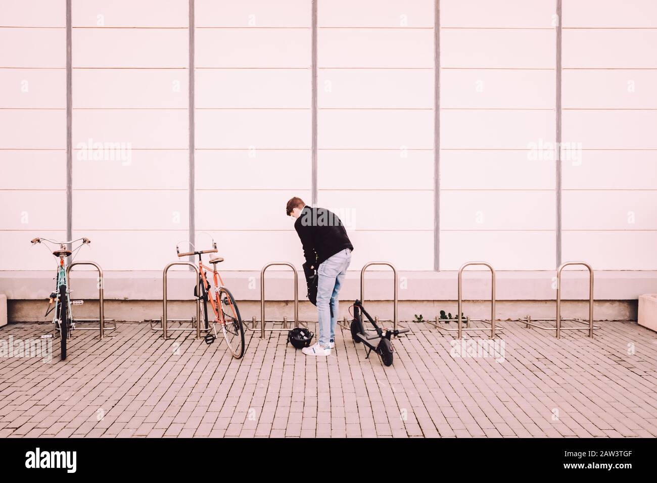 Valencia, Spain - February 5, 2020: Young student parking her bicycle ...