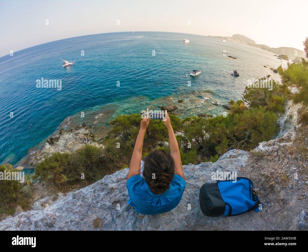 Girl Sitting On Edge Cliff High Resolution Stock Photography and Images ...