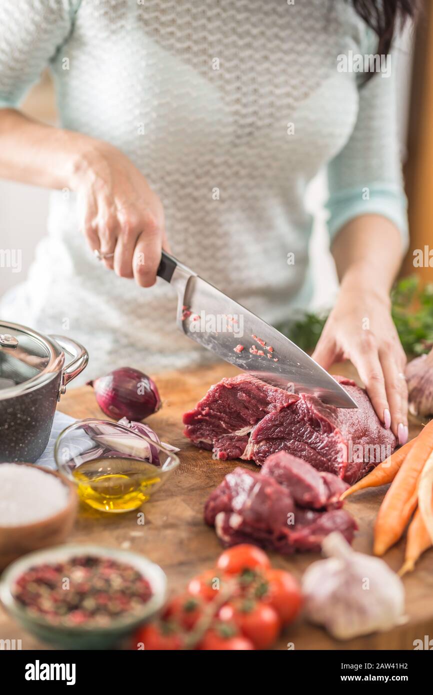 Woman eating beef steak hi-res stock photography and images - Alamy
