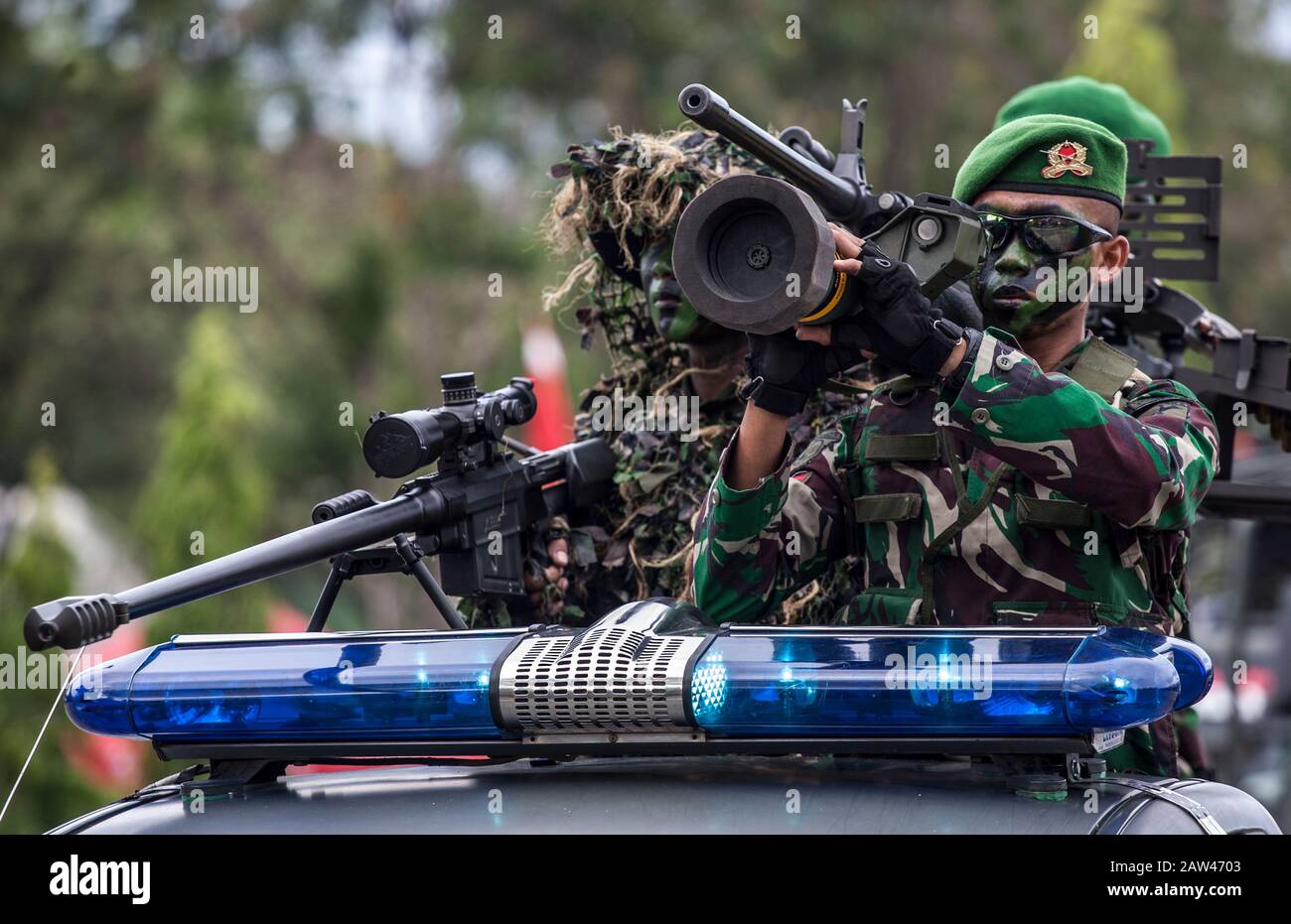 Indonesia army take part in a parade to mark the 74th anniversary of ...