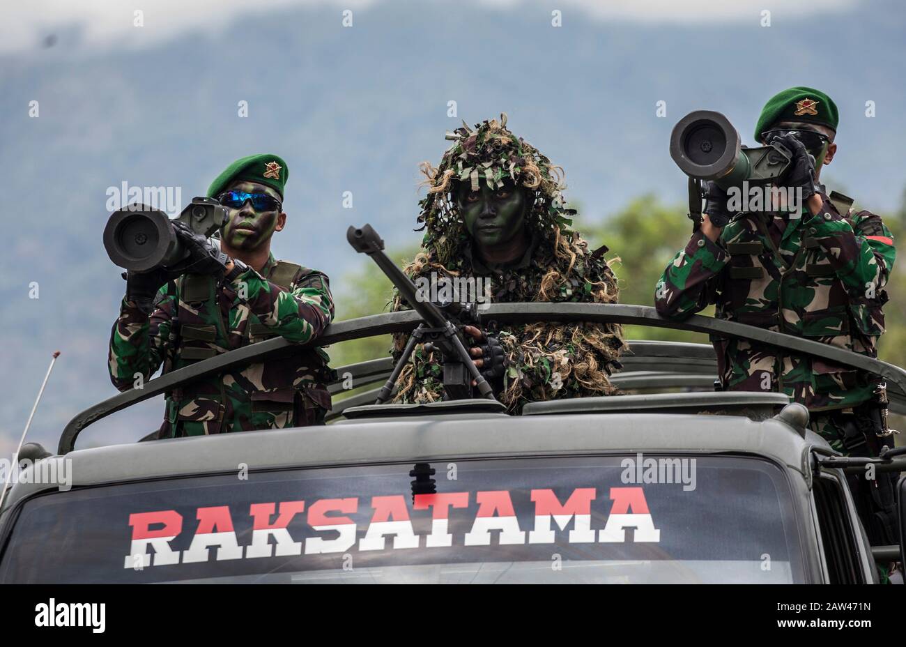 Indonesia army take part in a parade to mark the 74th anniversary of ...