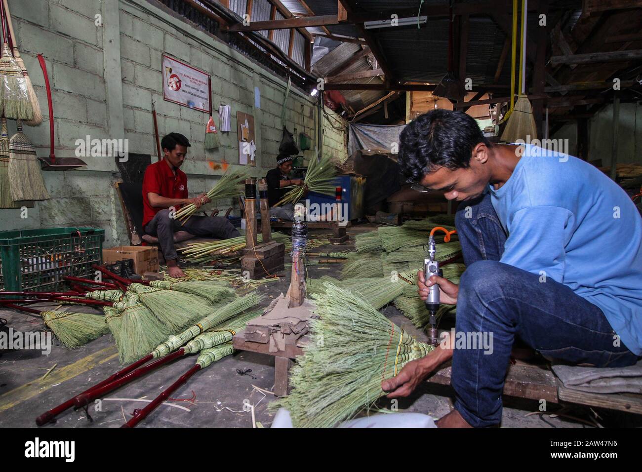 Workers were seen making brooms in the village of Ciherang Pondok ...