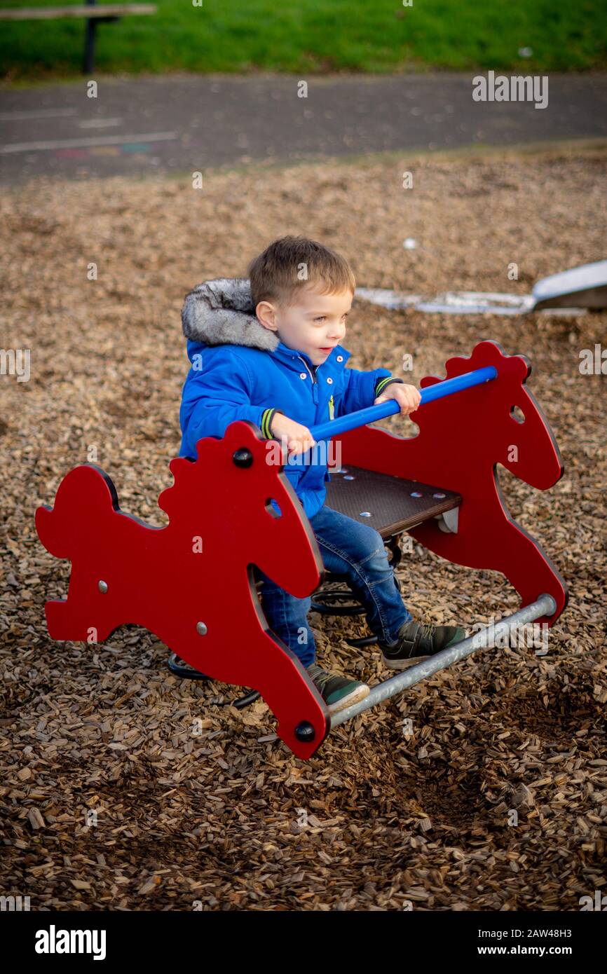 Play in parks hi-res stock photography and images - Alamy
