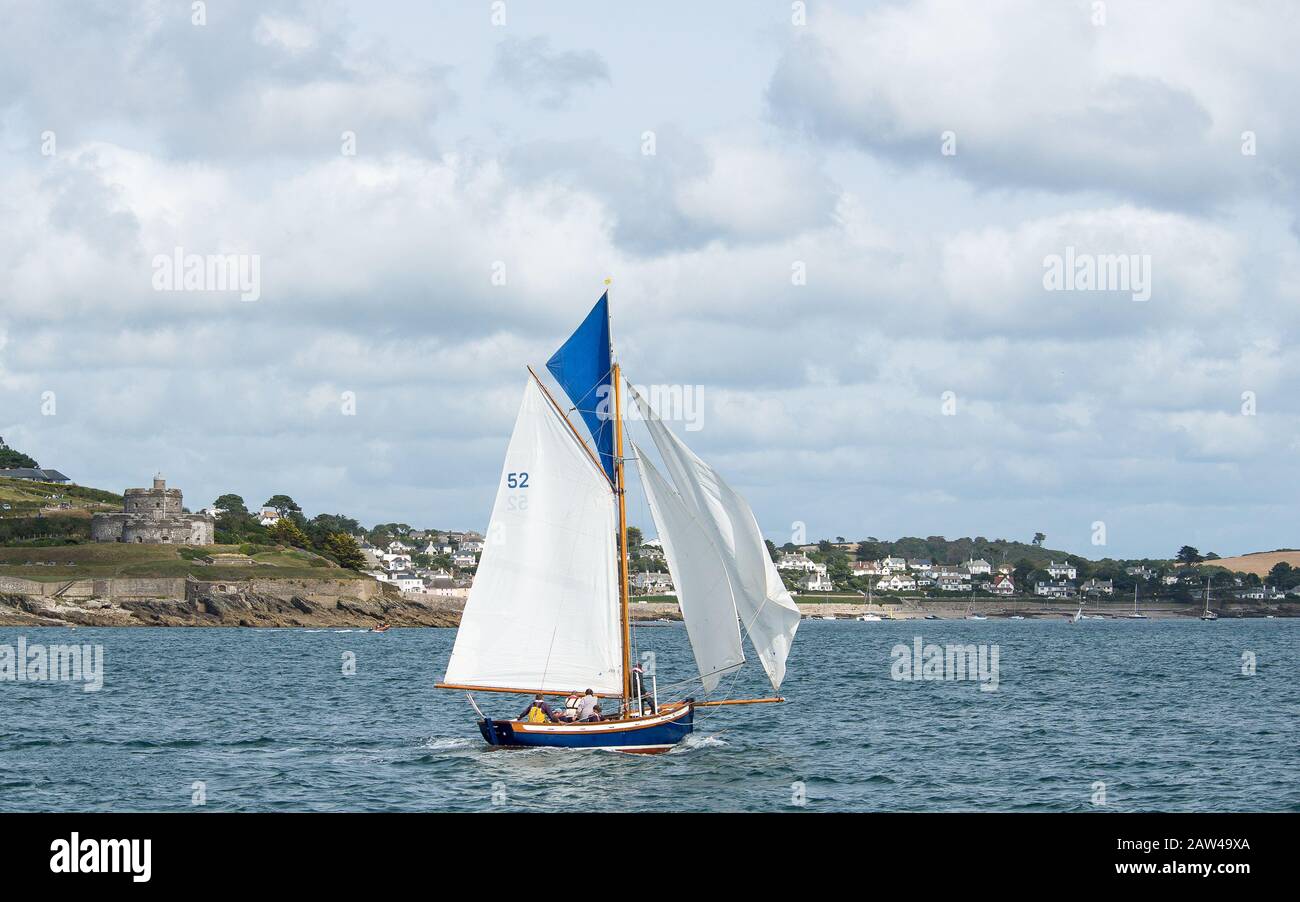 Traditional Falmouth working boats in full sail in the breezes of the ...